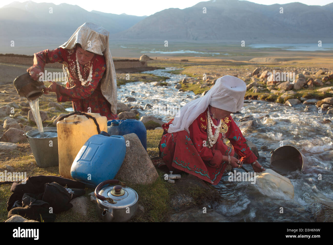 Women fetching water from a stream in the Wakhan Corridor, Badakhshan ...