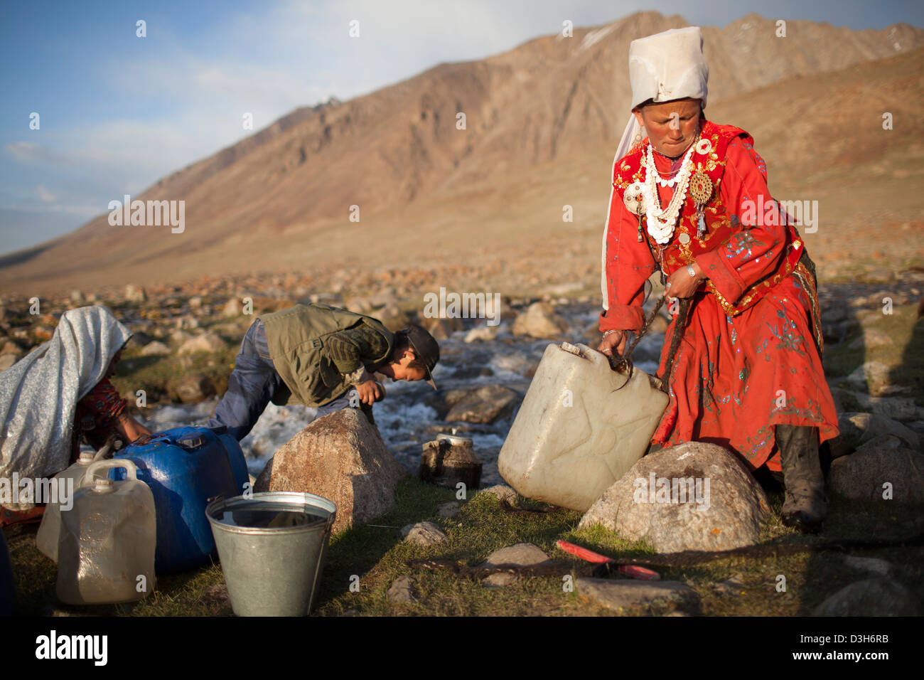 Women fetching water from a stream in the Wakhan Corridor, Badakhshan ...
