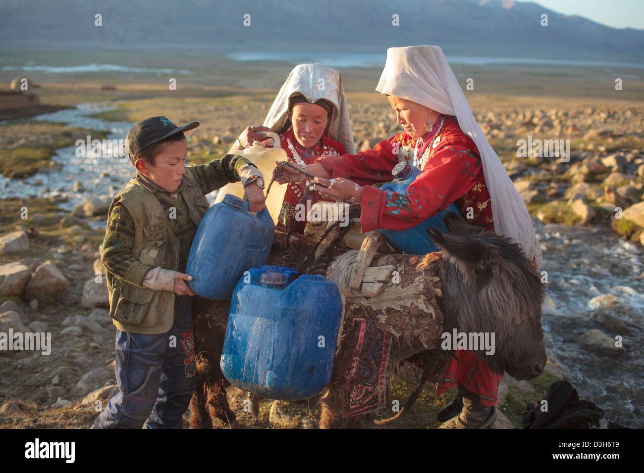 Women fetching water from a stream in the Wakhan Corridor, Badakhshan ...