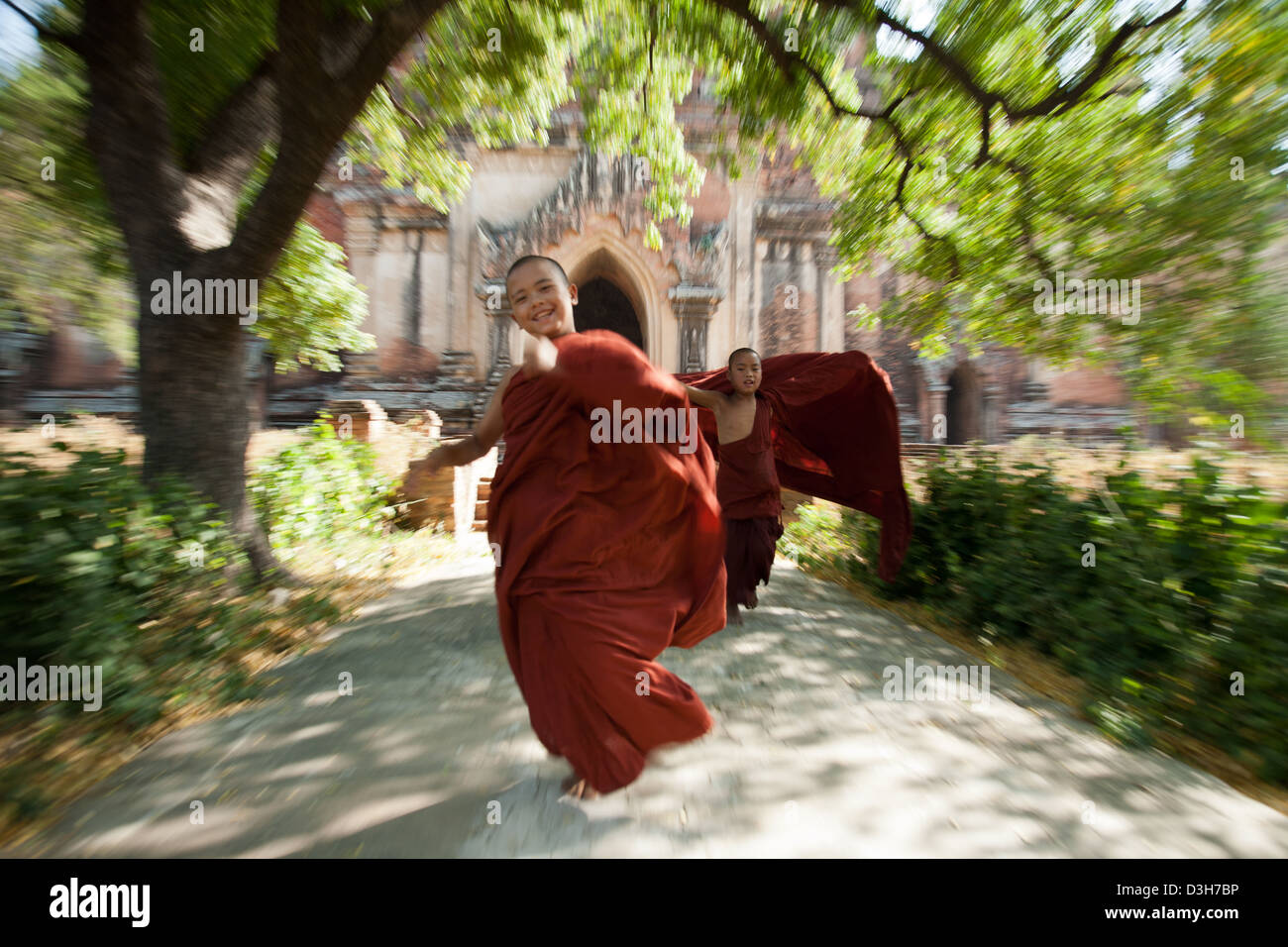 Young buddhist monk running hi-res stock photography and images - Alamy