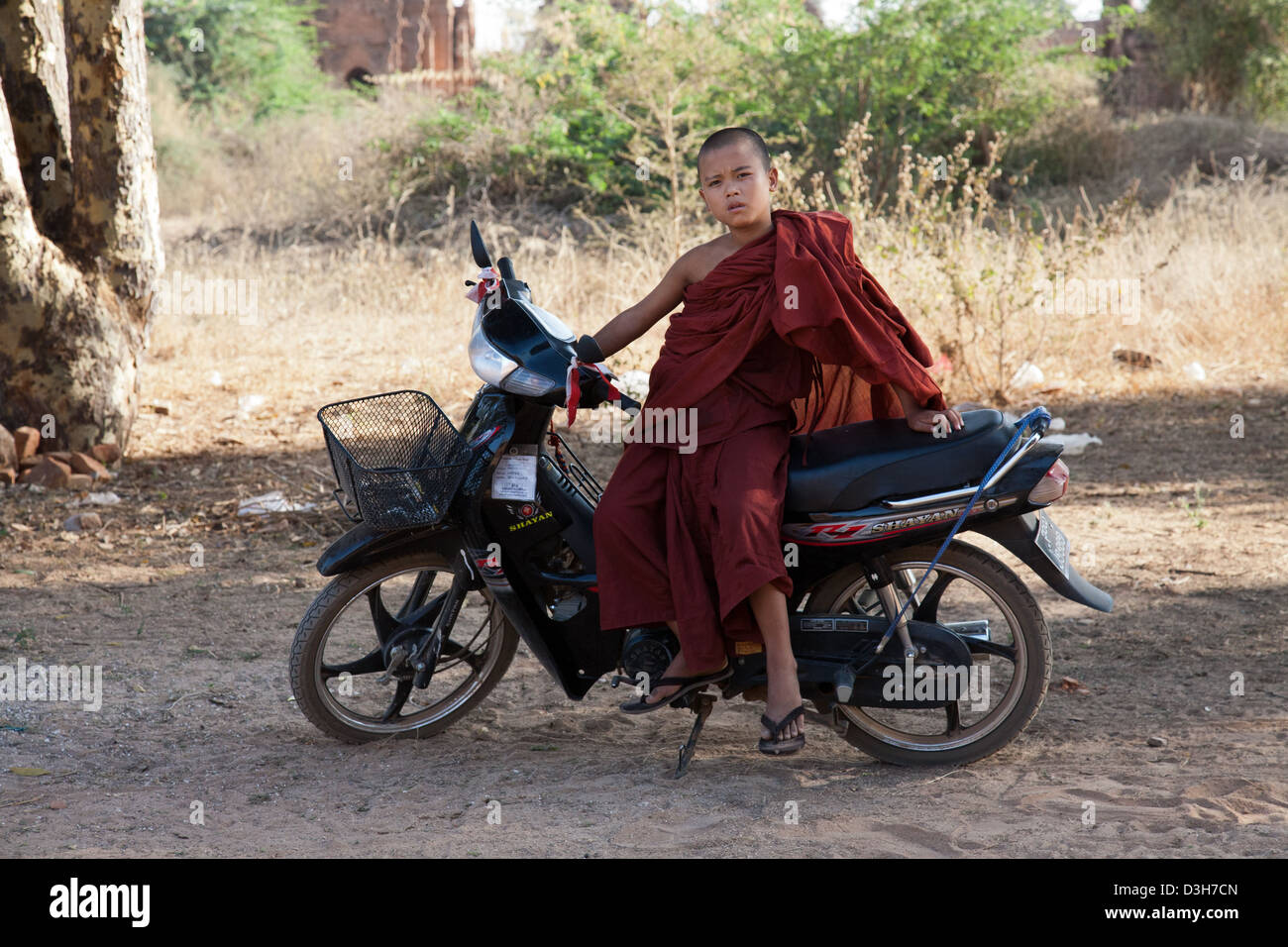 Young monks resting on a motor bike Bagan Stock Photo - Alamy