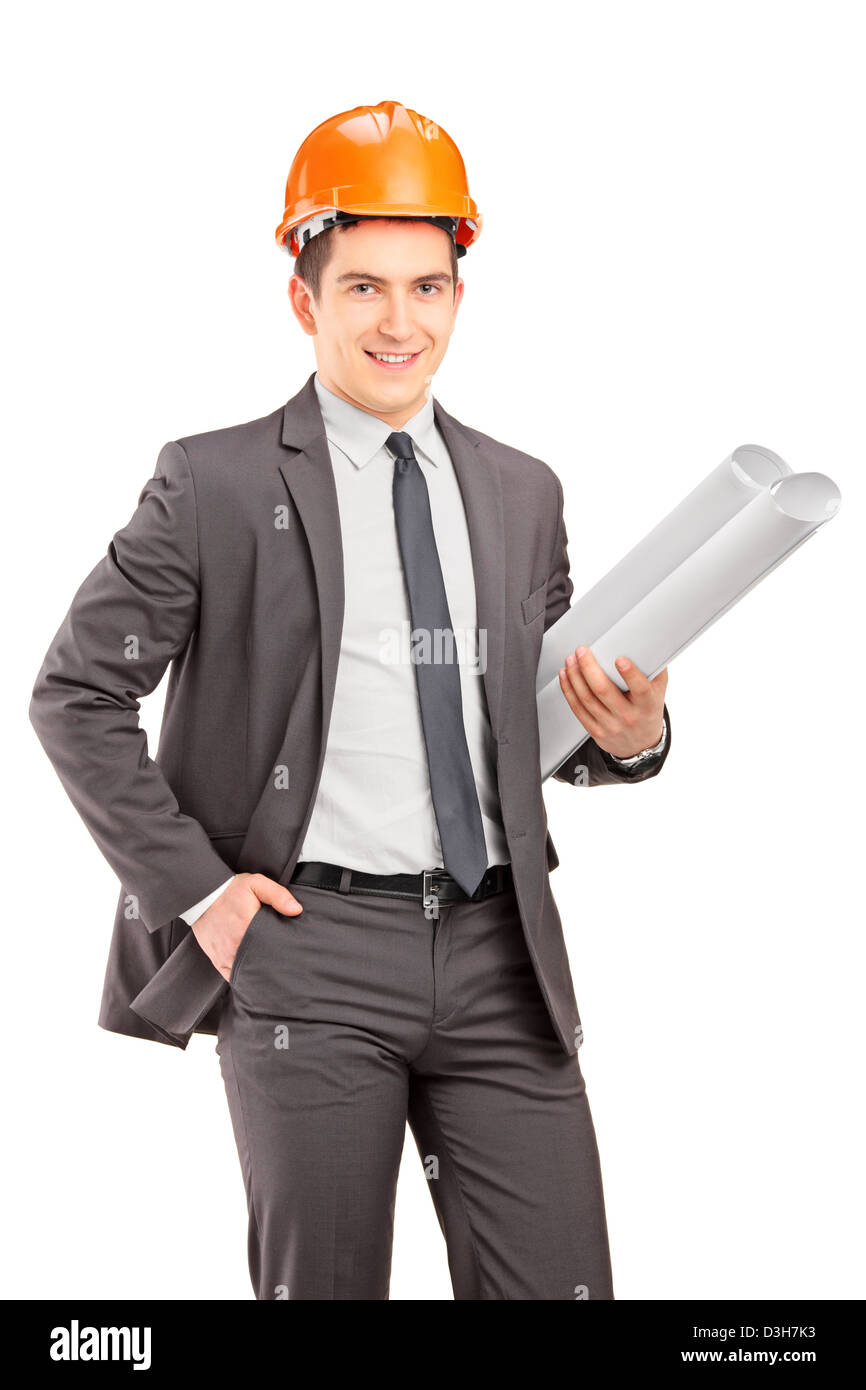 Young male engineer with helmet holding blueprints, isolated on white ...