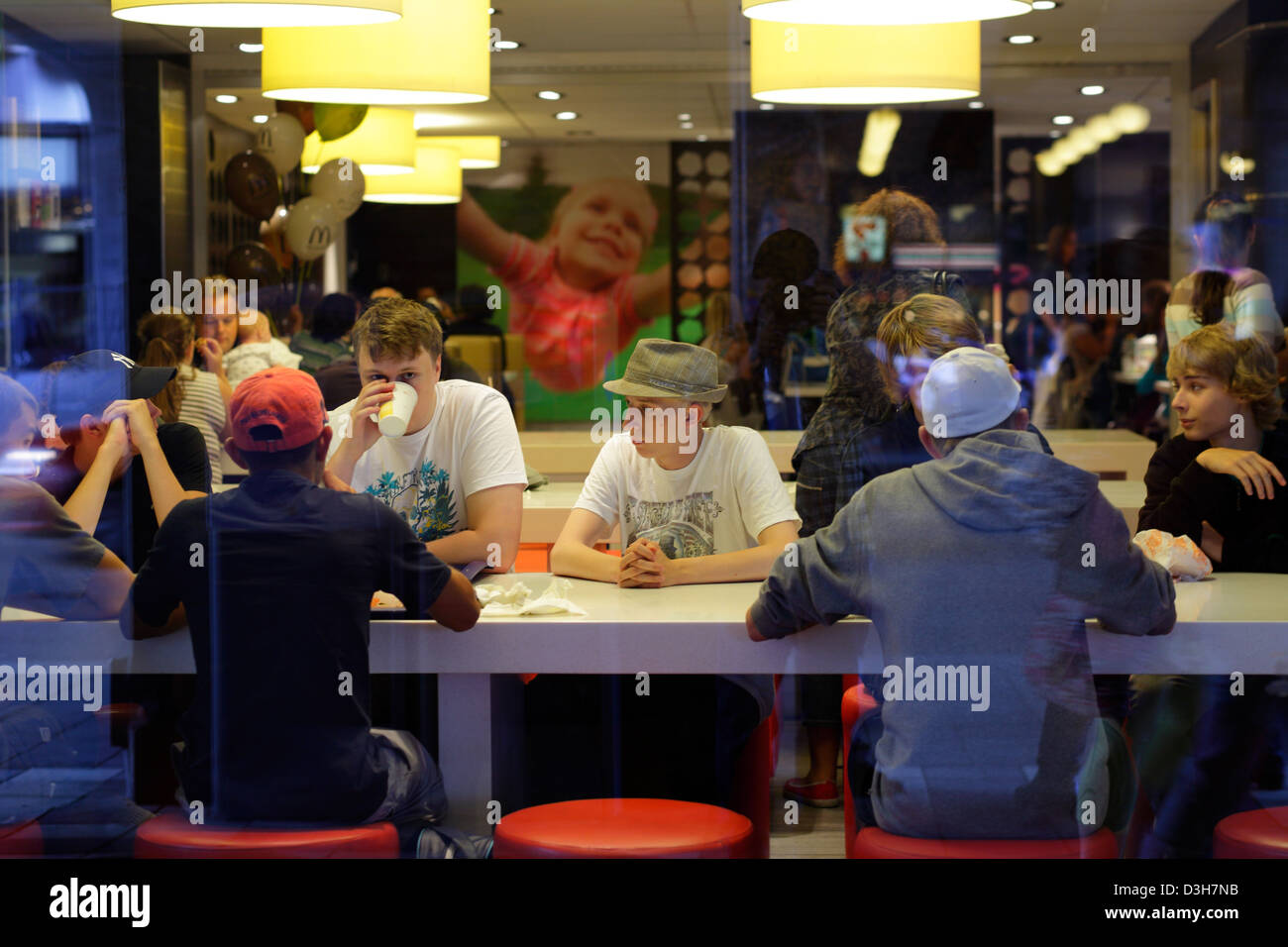 Teenagers Eating Fast Food Restaurant High Resolution Stock Photography ...