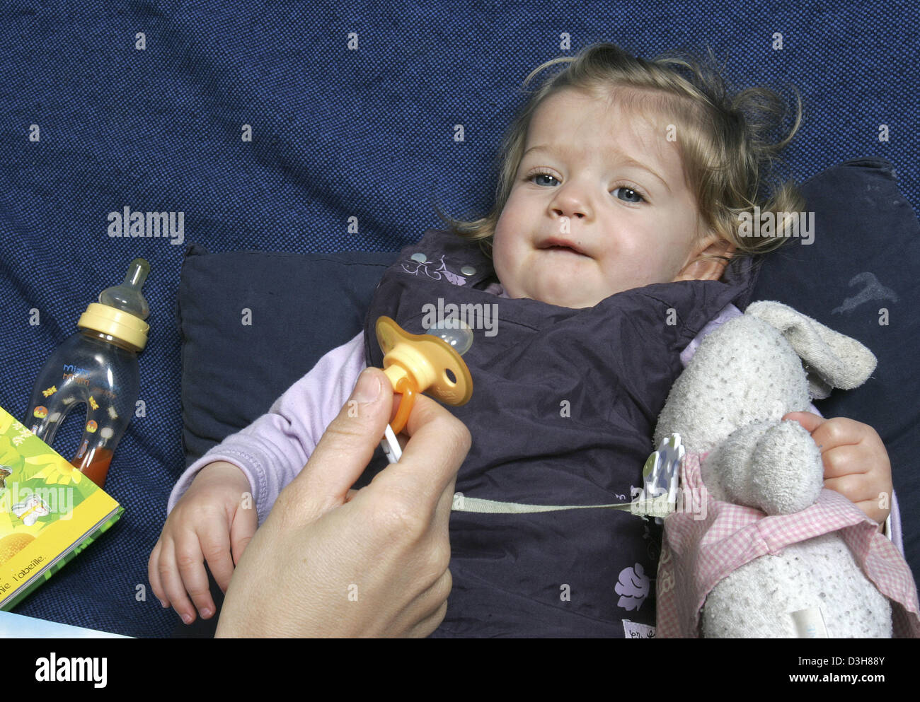 Girl sucking dummy hi-res stock photography and images - Alamy