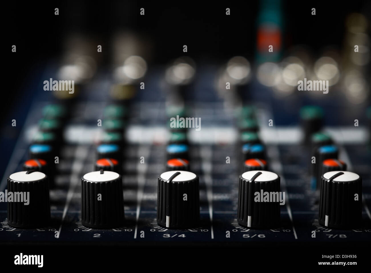 Detail of a music mixer desk with various knobs Stock Photo - Alamy