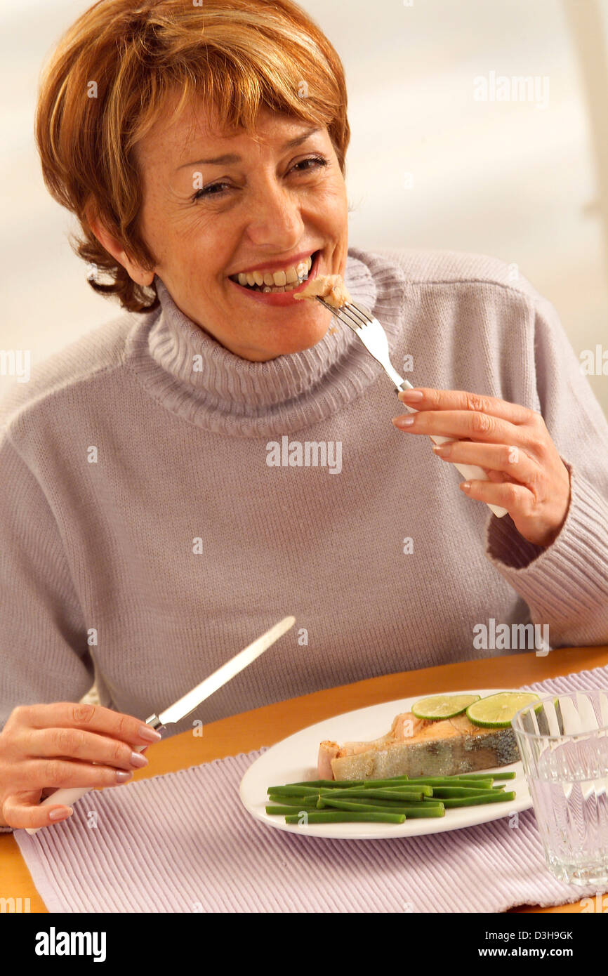Elderly eating oily fish hi-res stock photography and images - Alamy