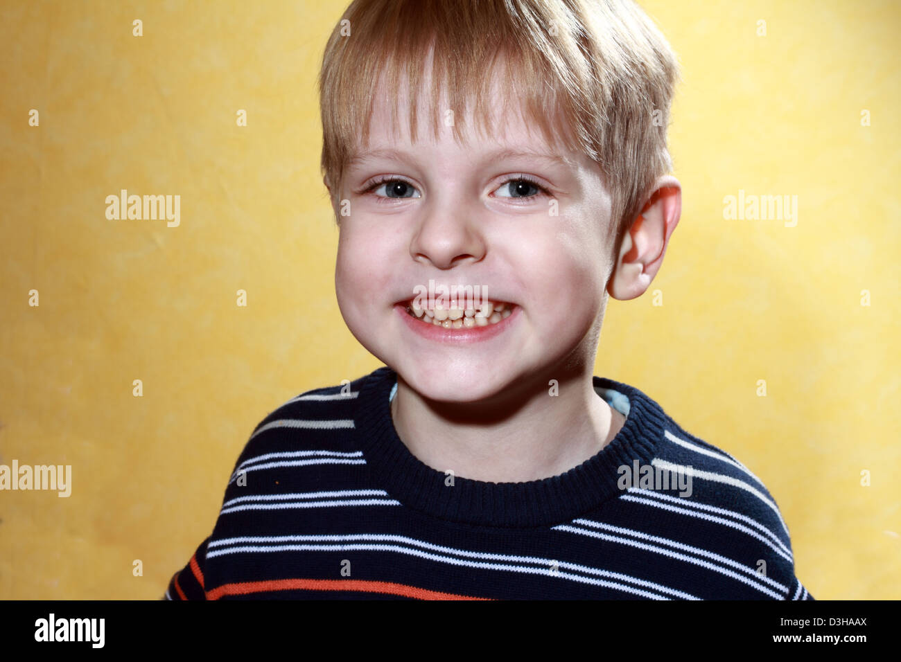 Happy young boy with smile on his face Stock Photo - Alamy