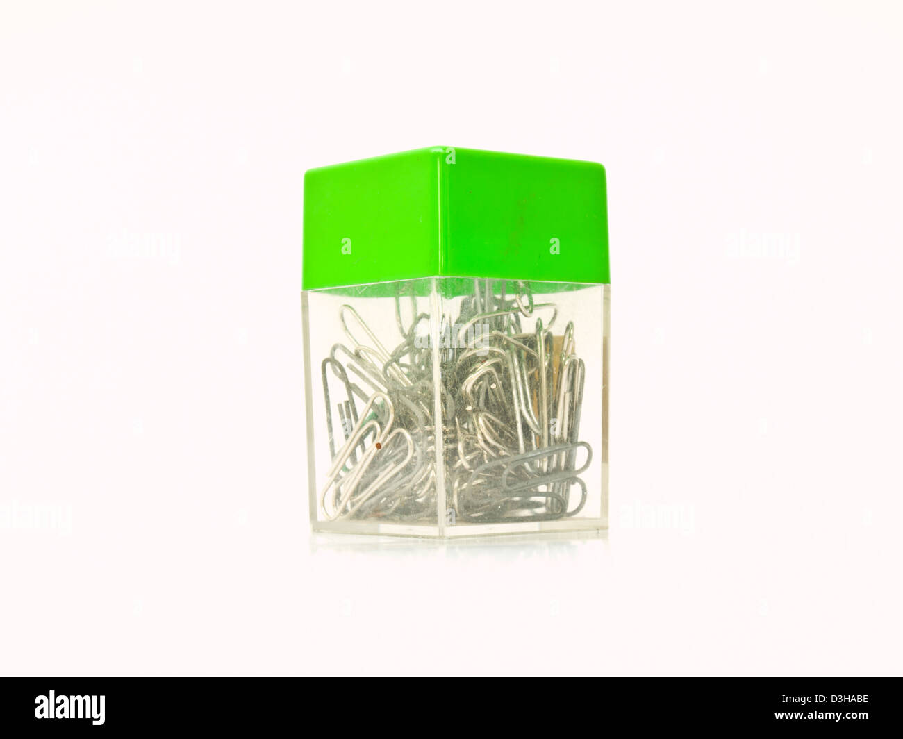 Used metal paper clips in used plastic container Stock Photo - Alamy