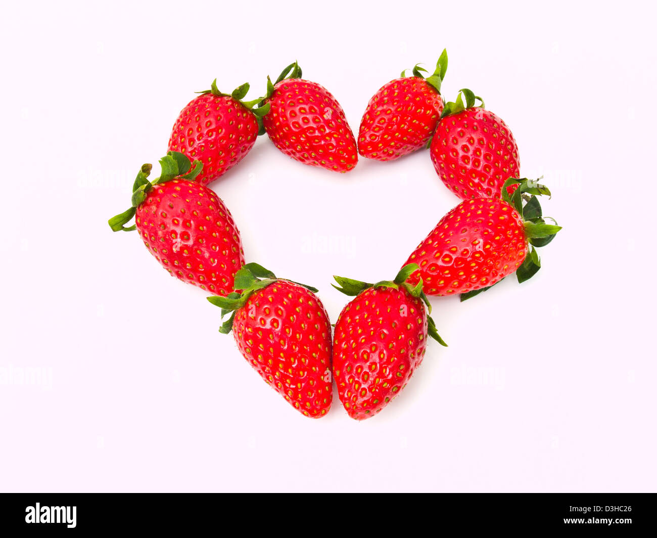 Fresh strawberry line in heart line Isolated on white background Stock ...