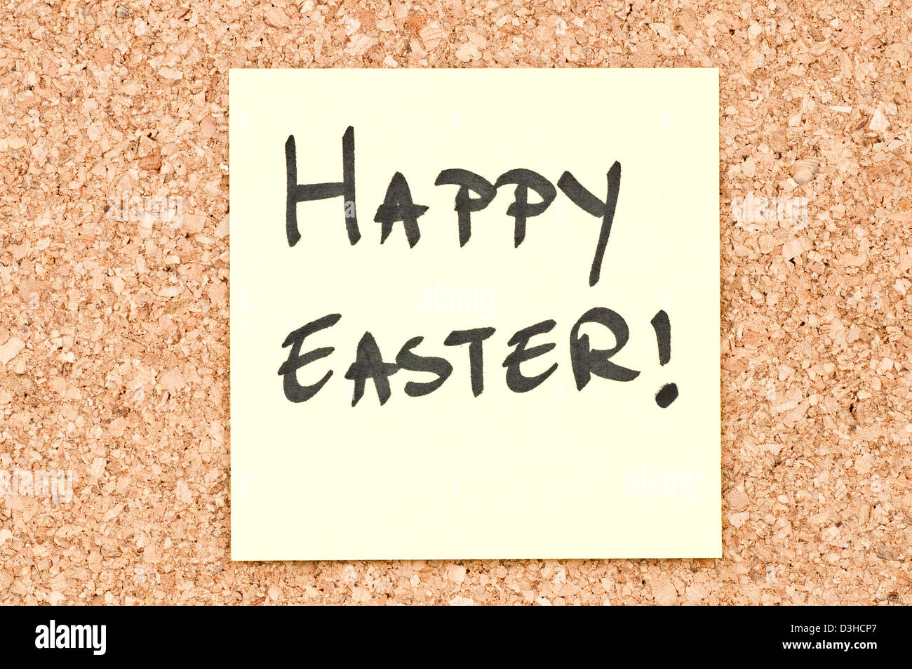 Happy Easter, handwritten on a sticky note Stock Photo - Alamy
