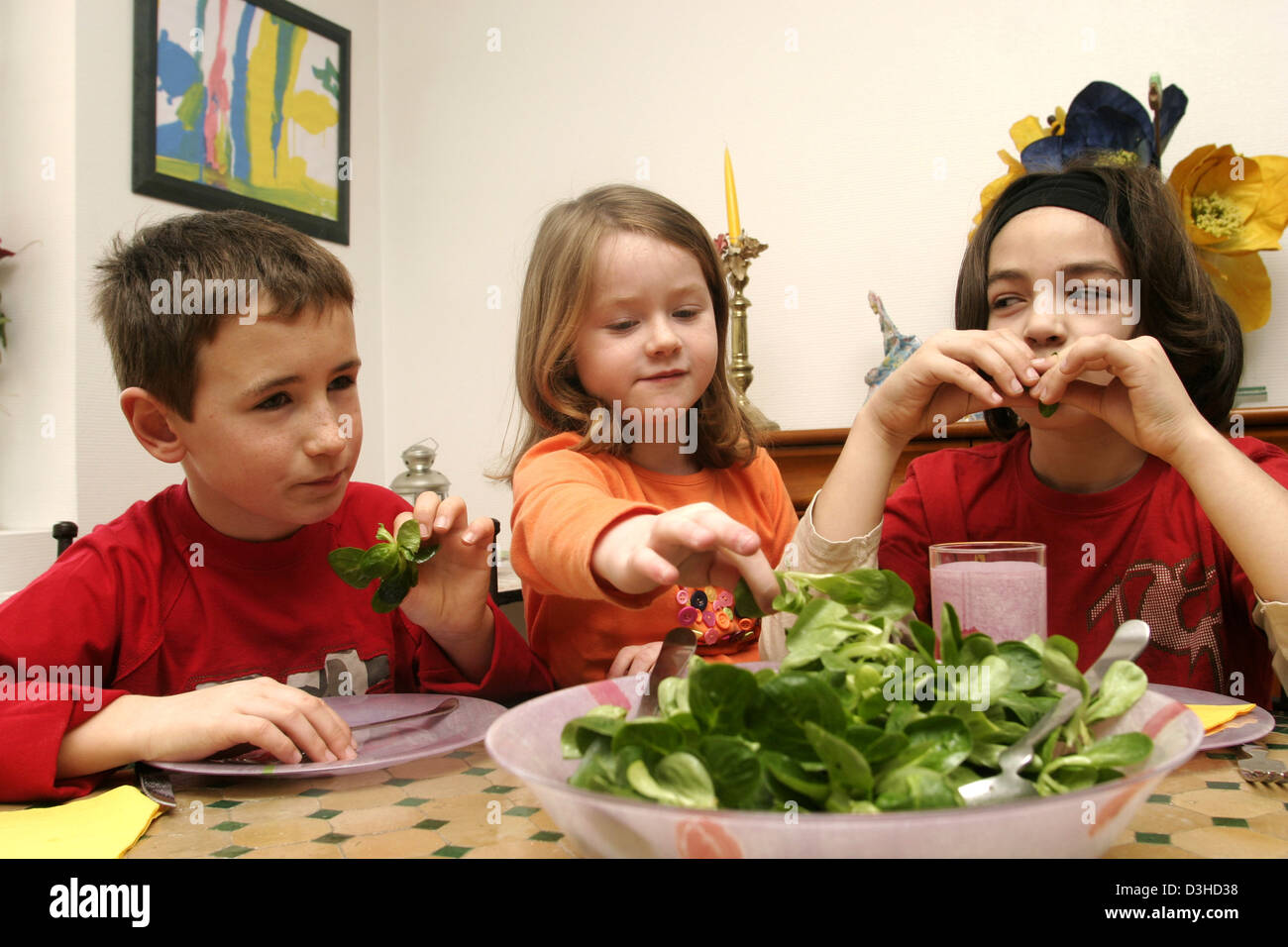 CHILD EATING RAW VEGETABLES Stock Photo - Alamy