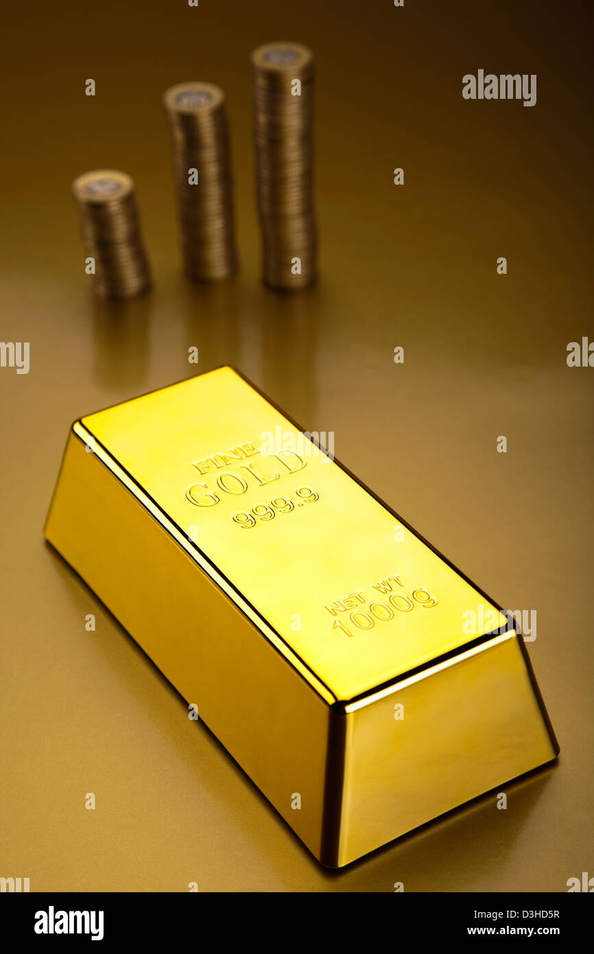 Gold bullion with coins Stock Photo - Alamy