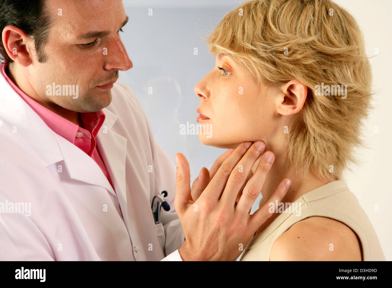 WOMAN PALPATING LYMPH NODE Stock Photo - Alamy