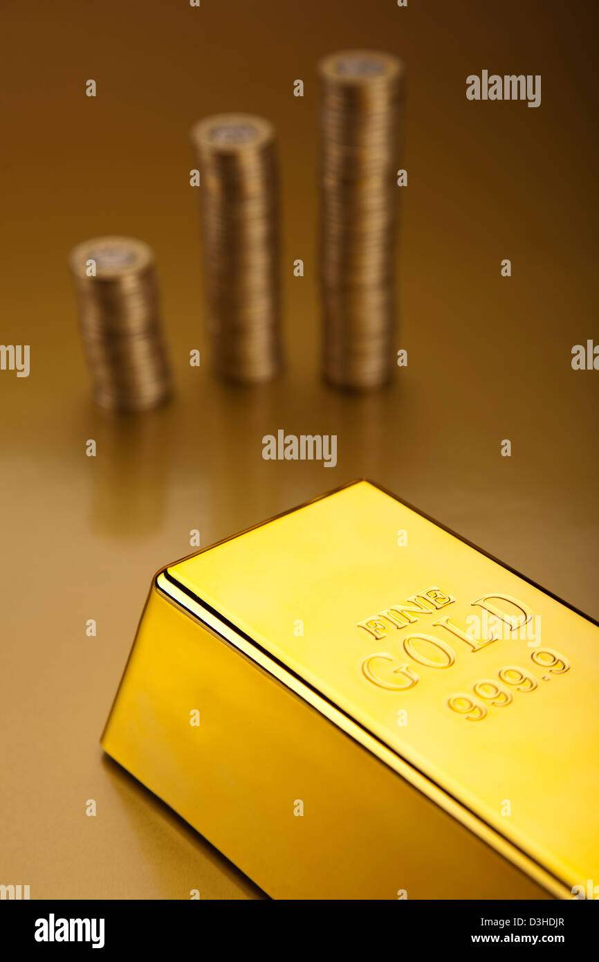 Gold bullion with coins Stock Photo - Alamy