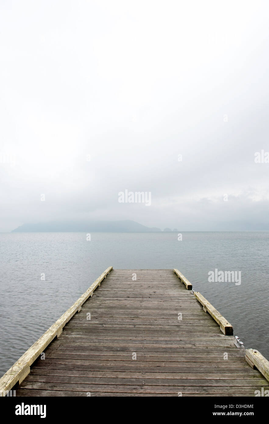 A floating dock on Harrison Lake, British Columbia, Canada, on a foggy ...