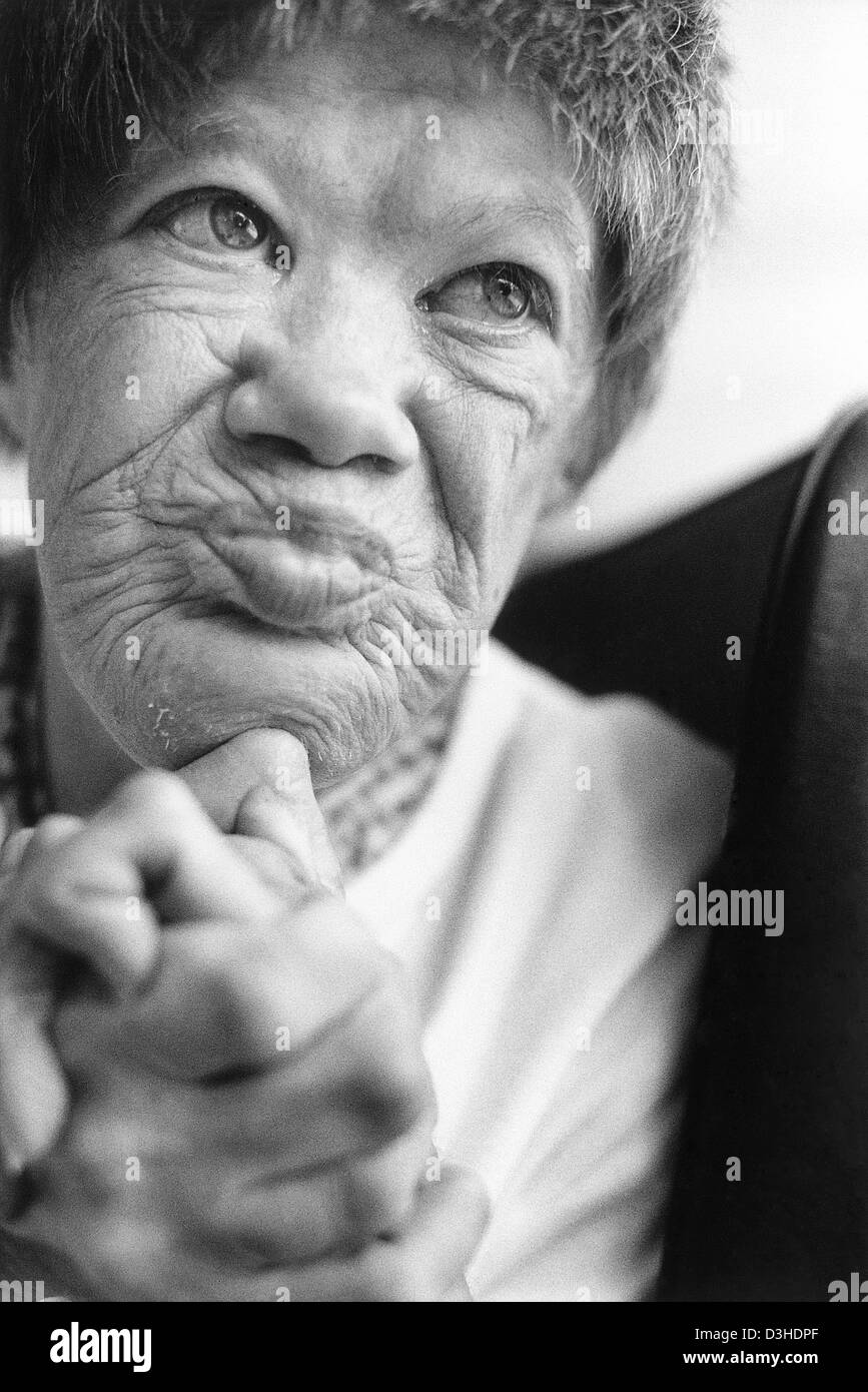 HANDICAPPED ELDERLY PERSON Stock Photo - Alamy