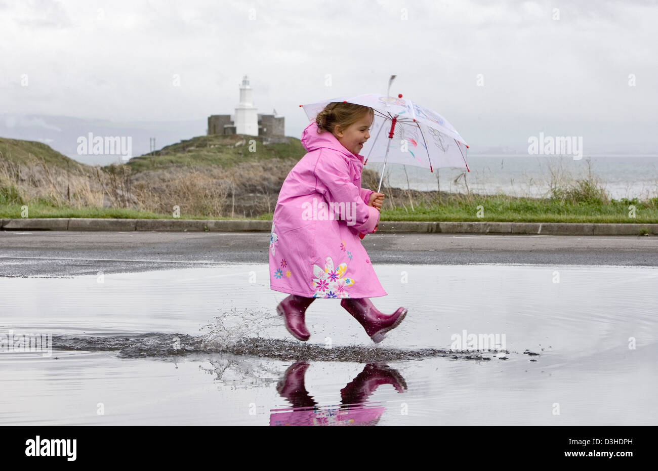 Kid Jump Puddle High Resolution Stock Photography and Images - Alamy