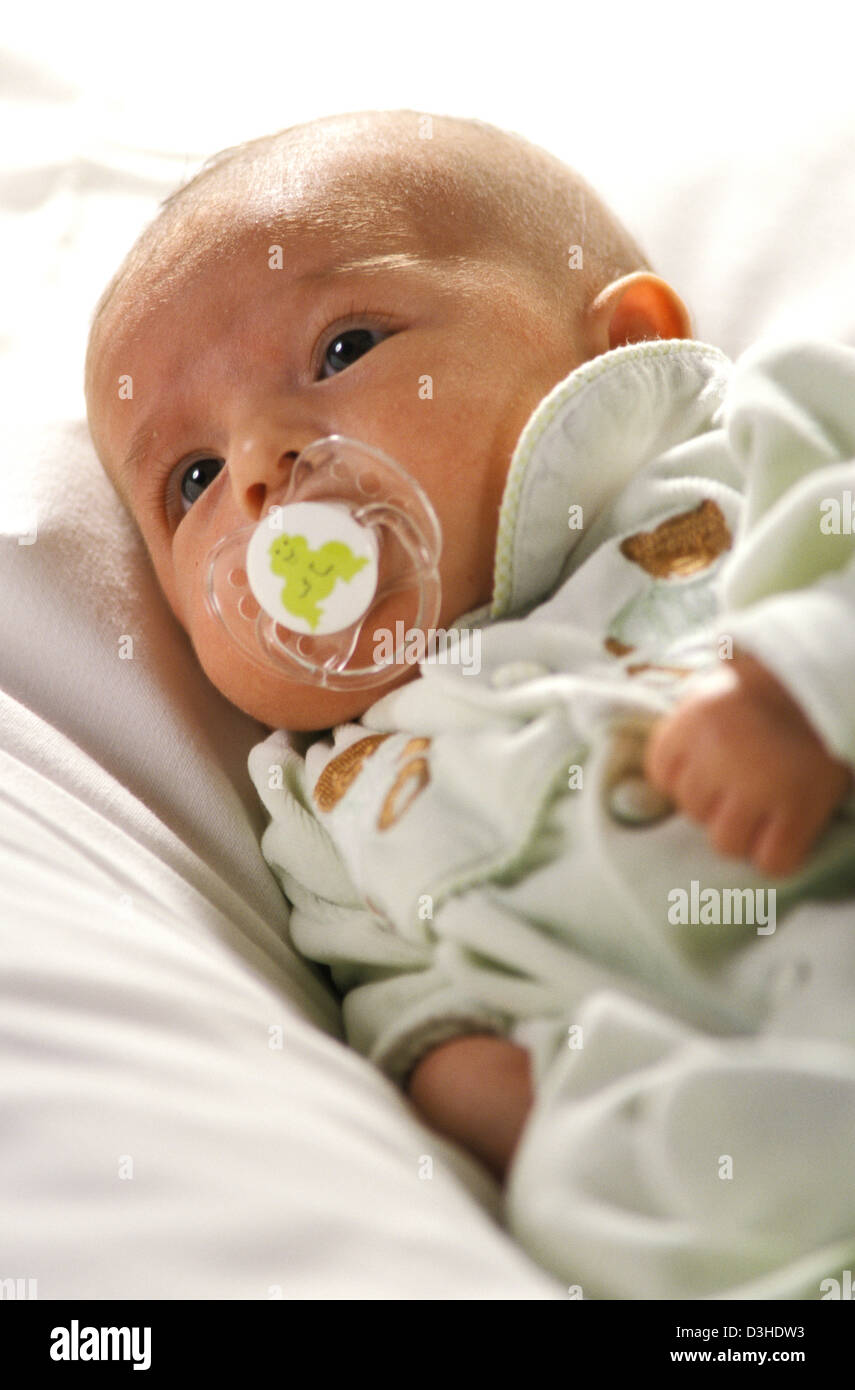 Baby suck dummies hi-res stock photography and images - Alamy