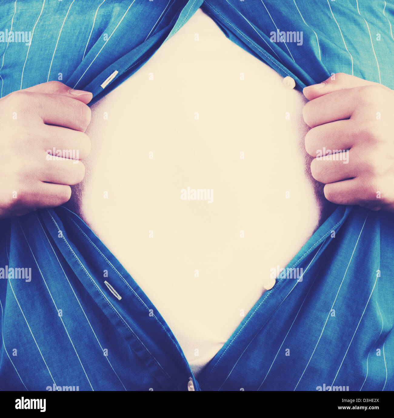 Business man tearing off his shirt Stock Photo - Alamy