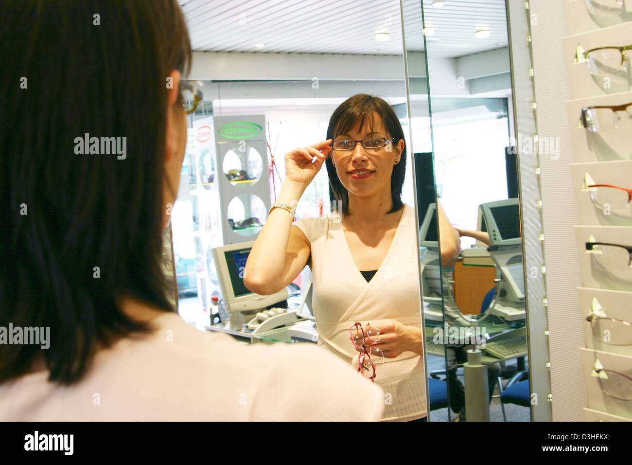Mature Women Trying On Glasses Stock Photos & Mature Women Trying On ...
