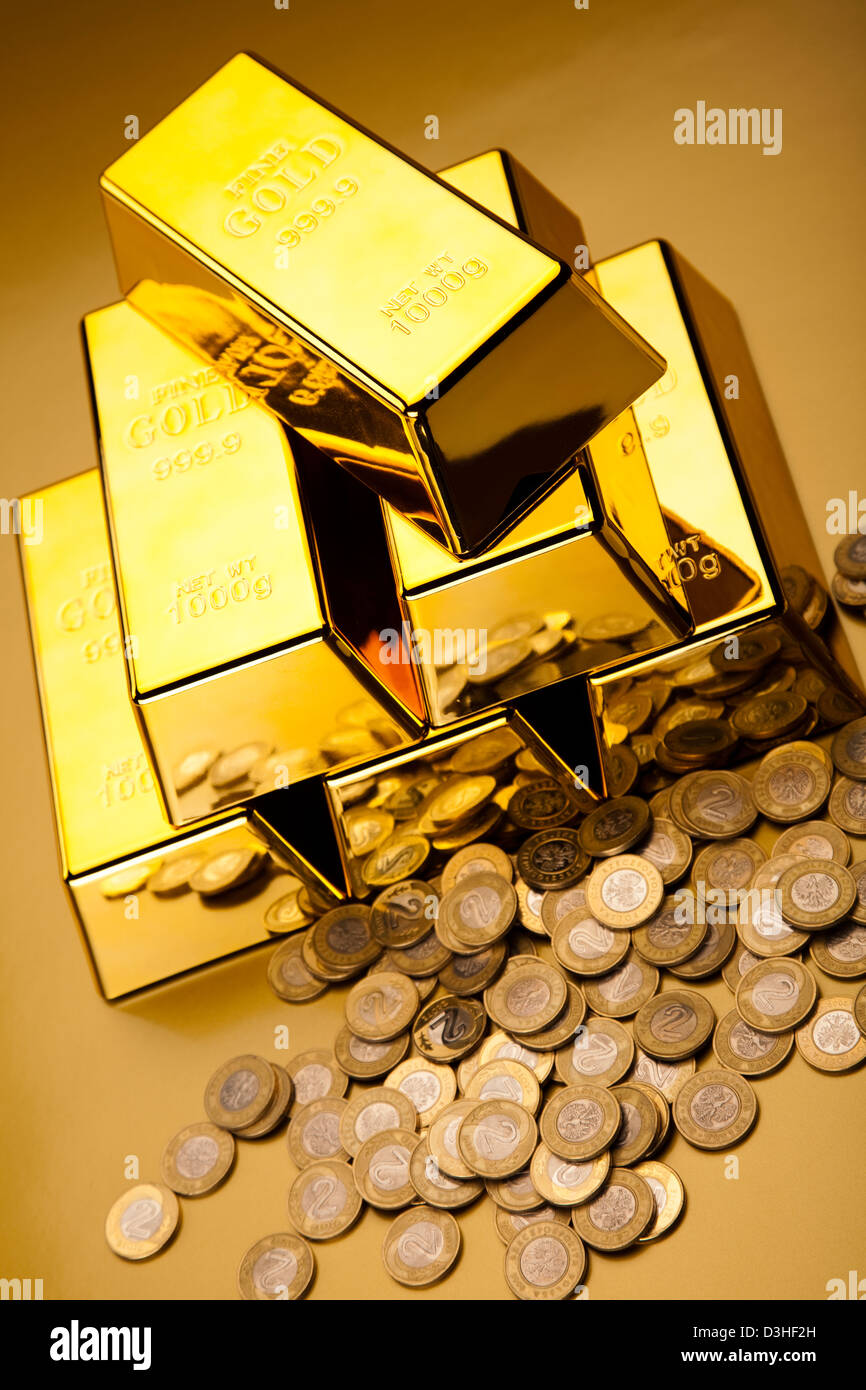 Gold bullion with coins Stock Photo - Alamy