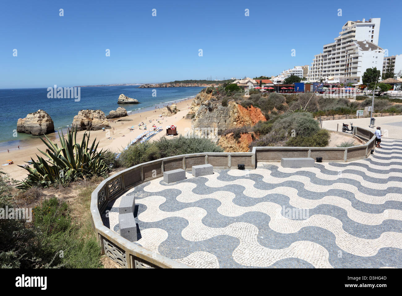 Promenade along the Algarve beach Praia da Rocha in Portimao, Portugal ...
