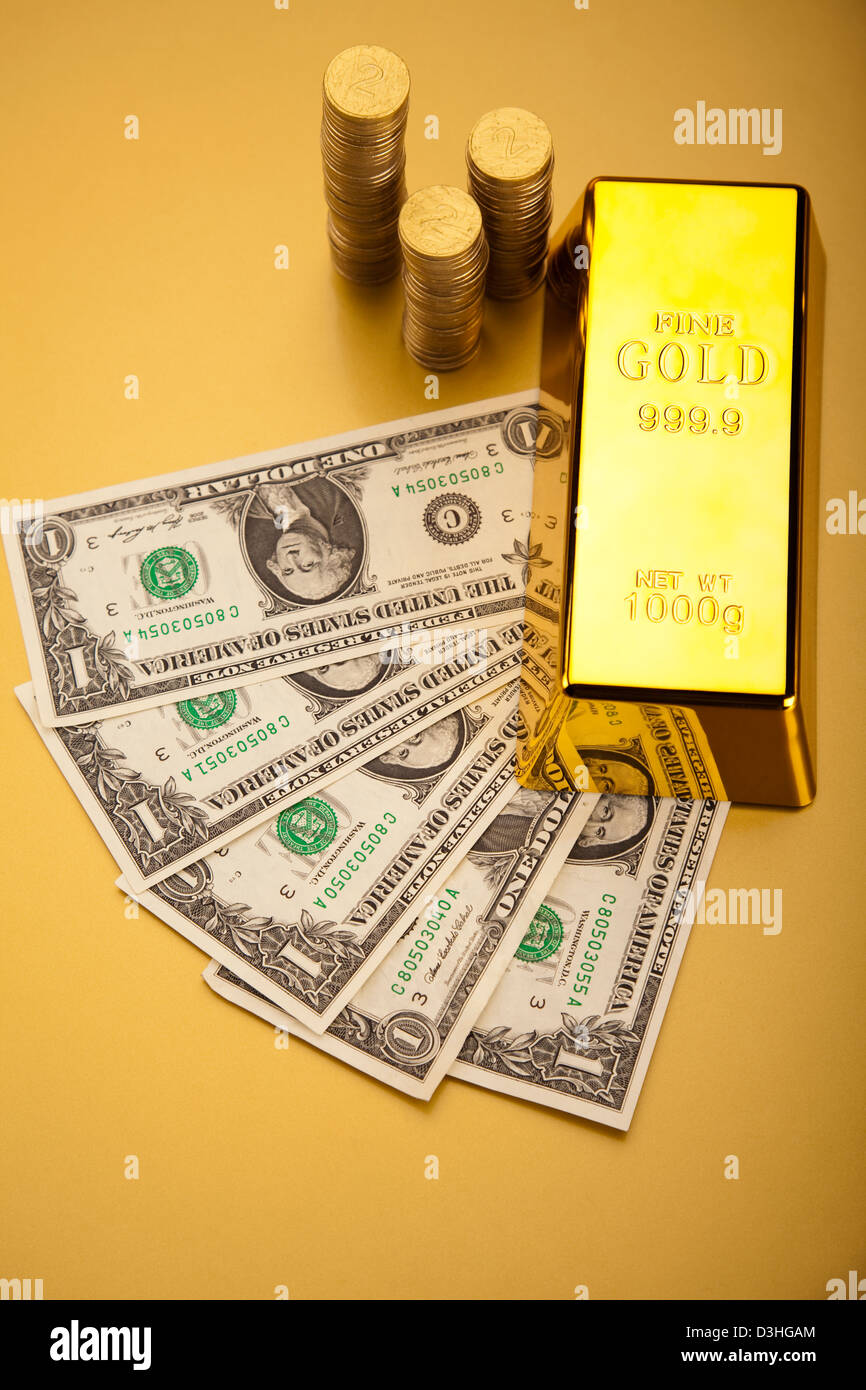 Gold and money Stock Photo - Alamy