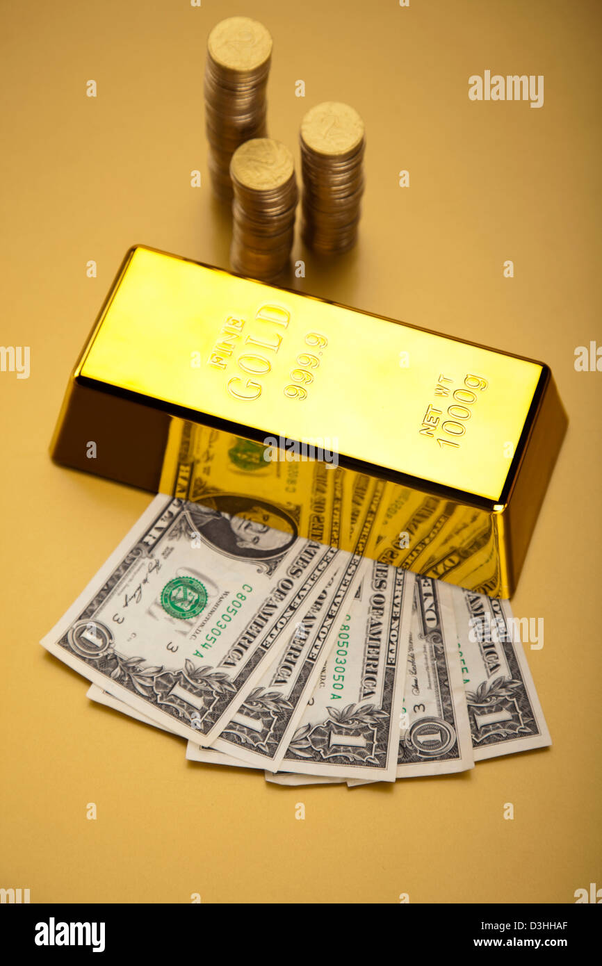 Gold and money Stock Photo - Alamy
