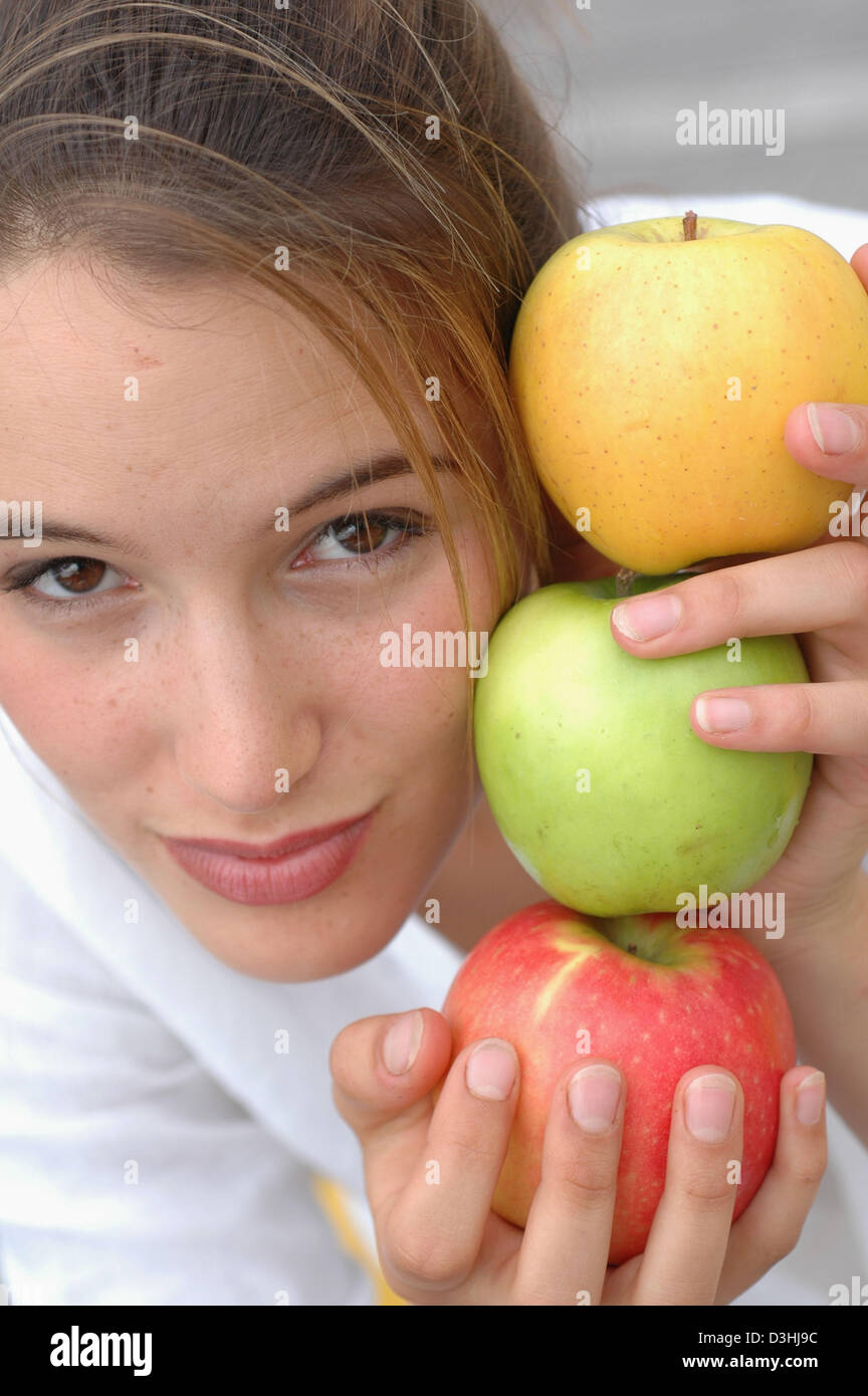 WOMAN EATING FRUIT Stock Photo - Alamy