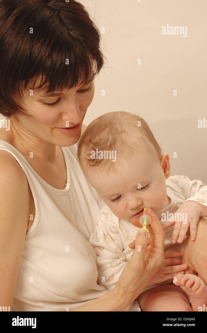 INFANT TAKING MEDICATION Stock Photo - Alamy