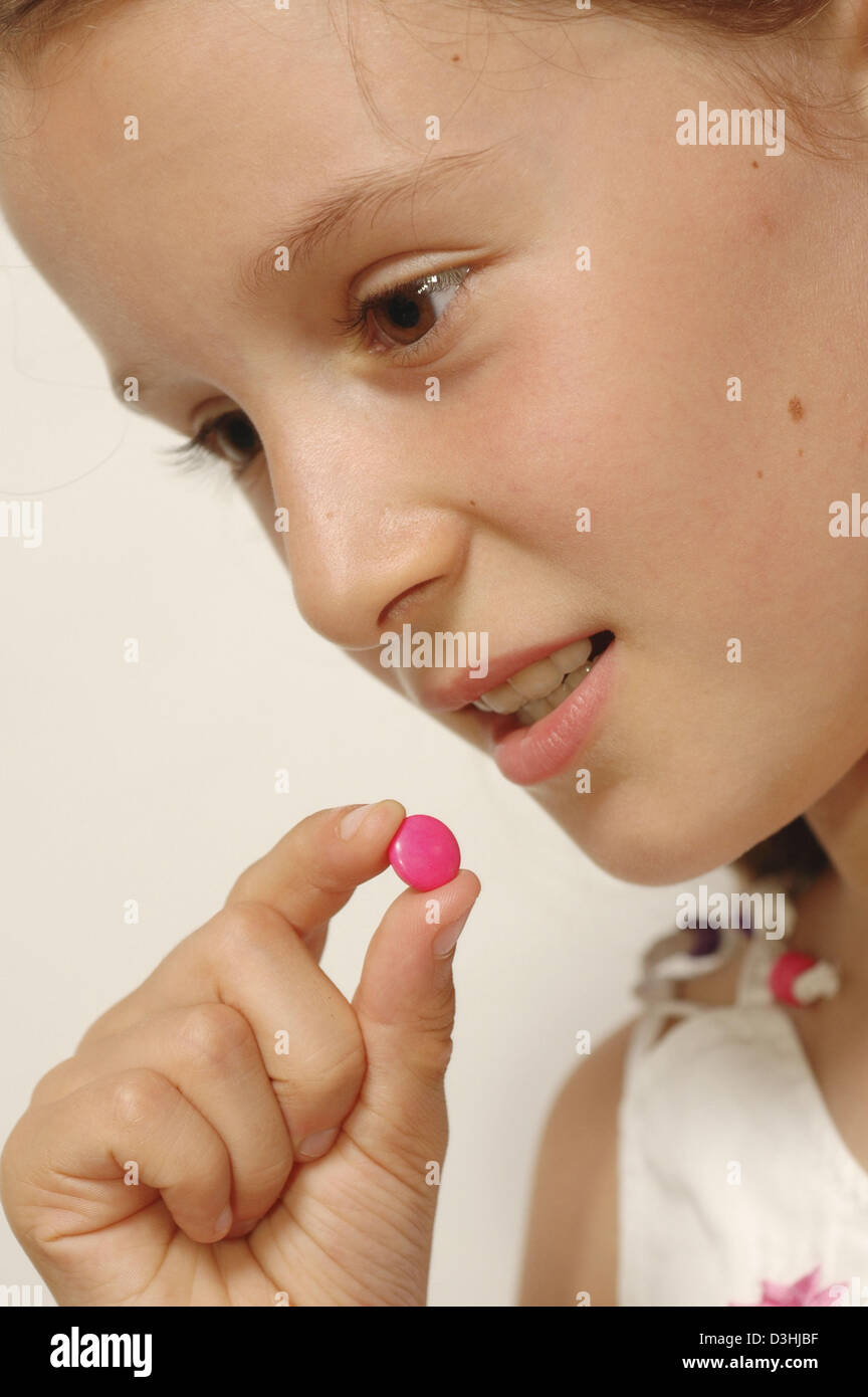 CHILD TAKING MEDICATION Stock Photo - Alamy
