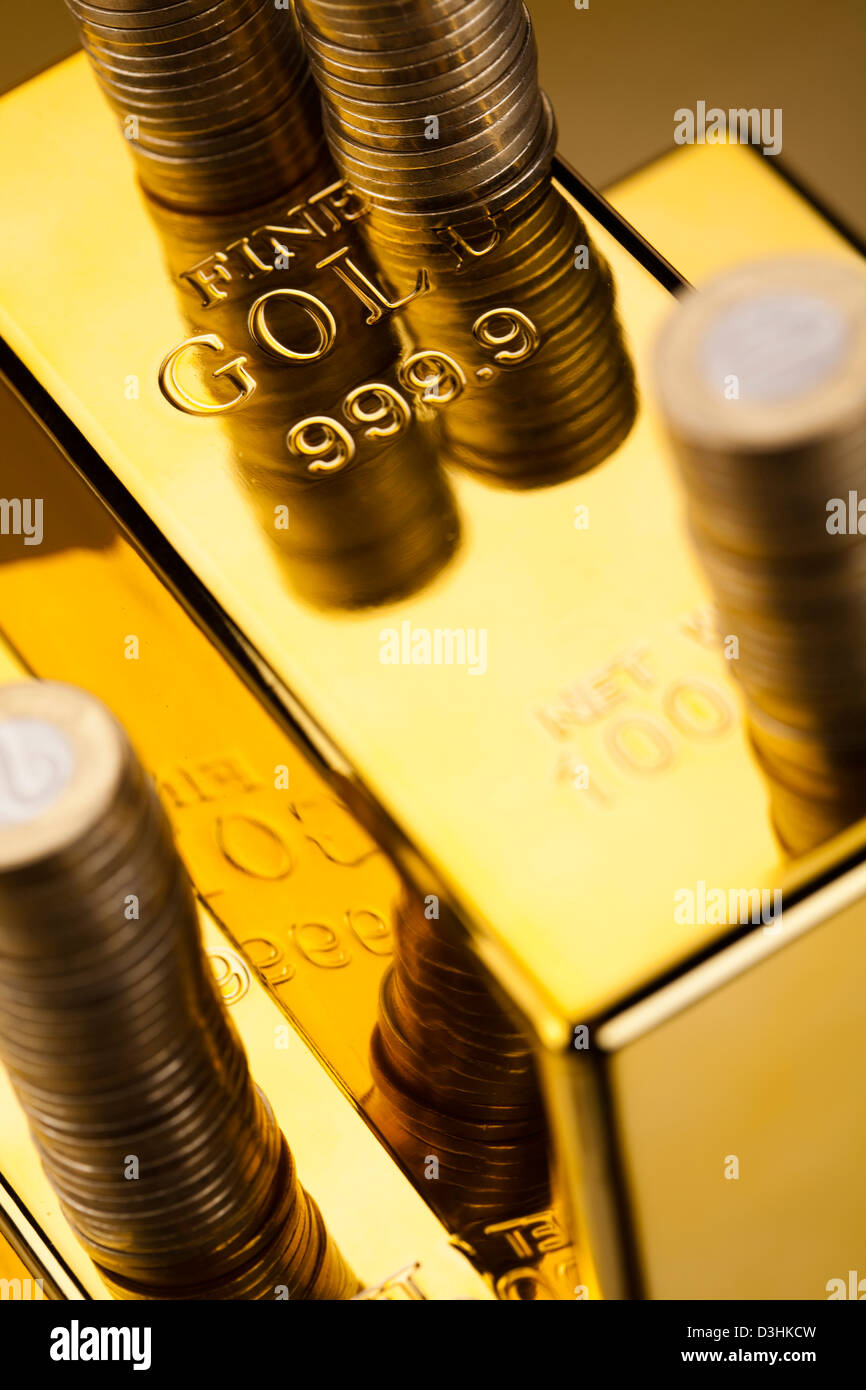 Gold bullion with coins Stock Photo - Alamy
