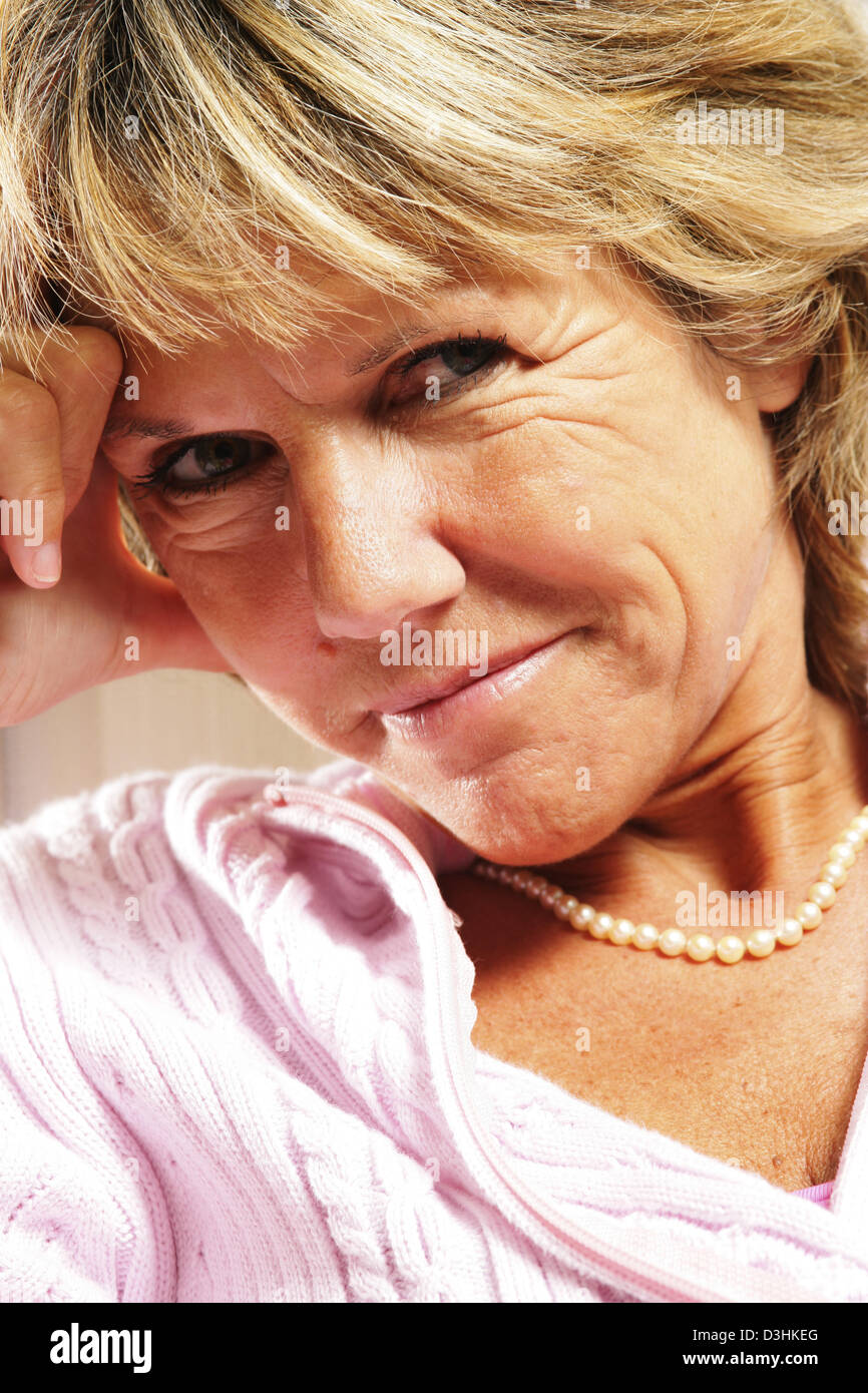 PORTRAIT OF -65 YR-OLD WOMAN Stock Photo - Alamy
