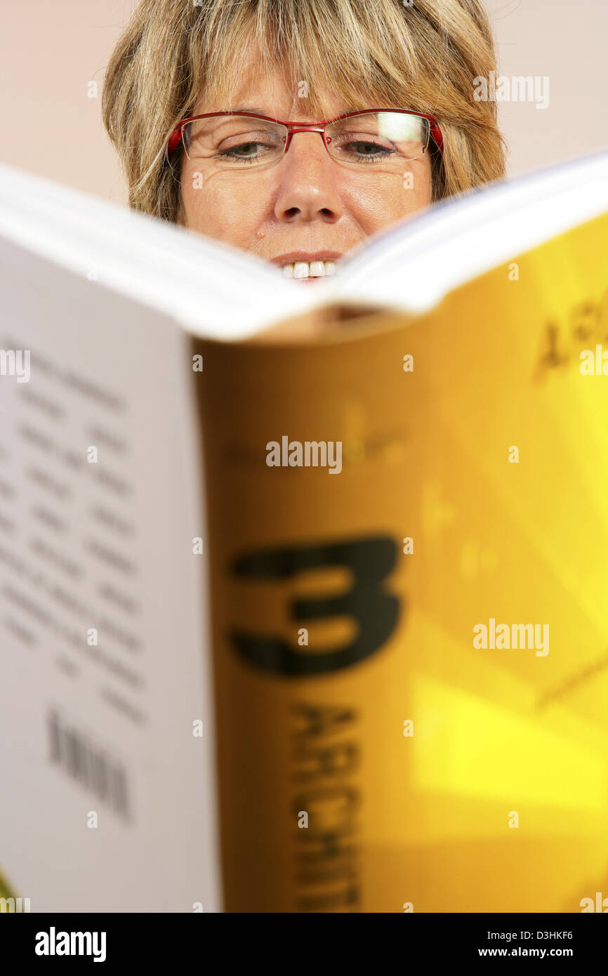 ELDERLY PERSON READING Stock Photo - Alamy