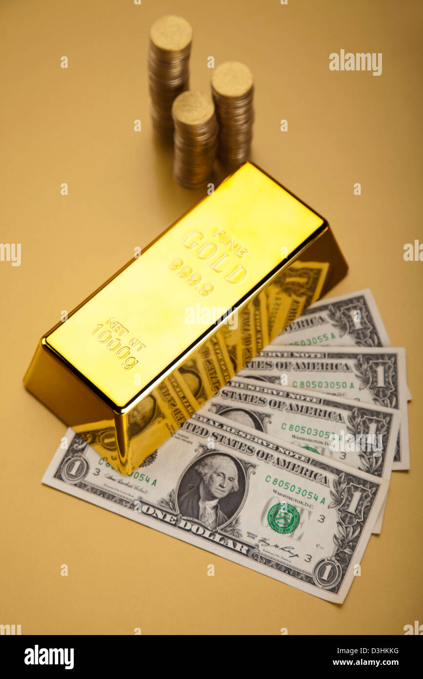 Gold and money Stock Photo - Alamy