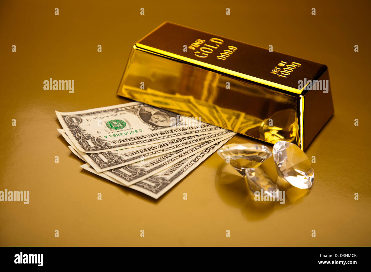 Diamond, money and gold Stock Photo - Alamy