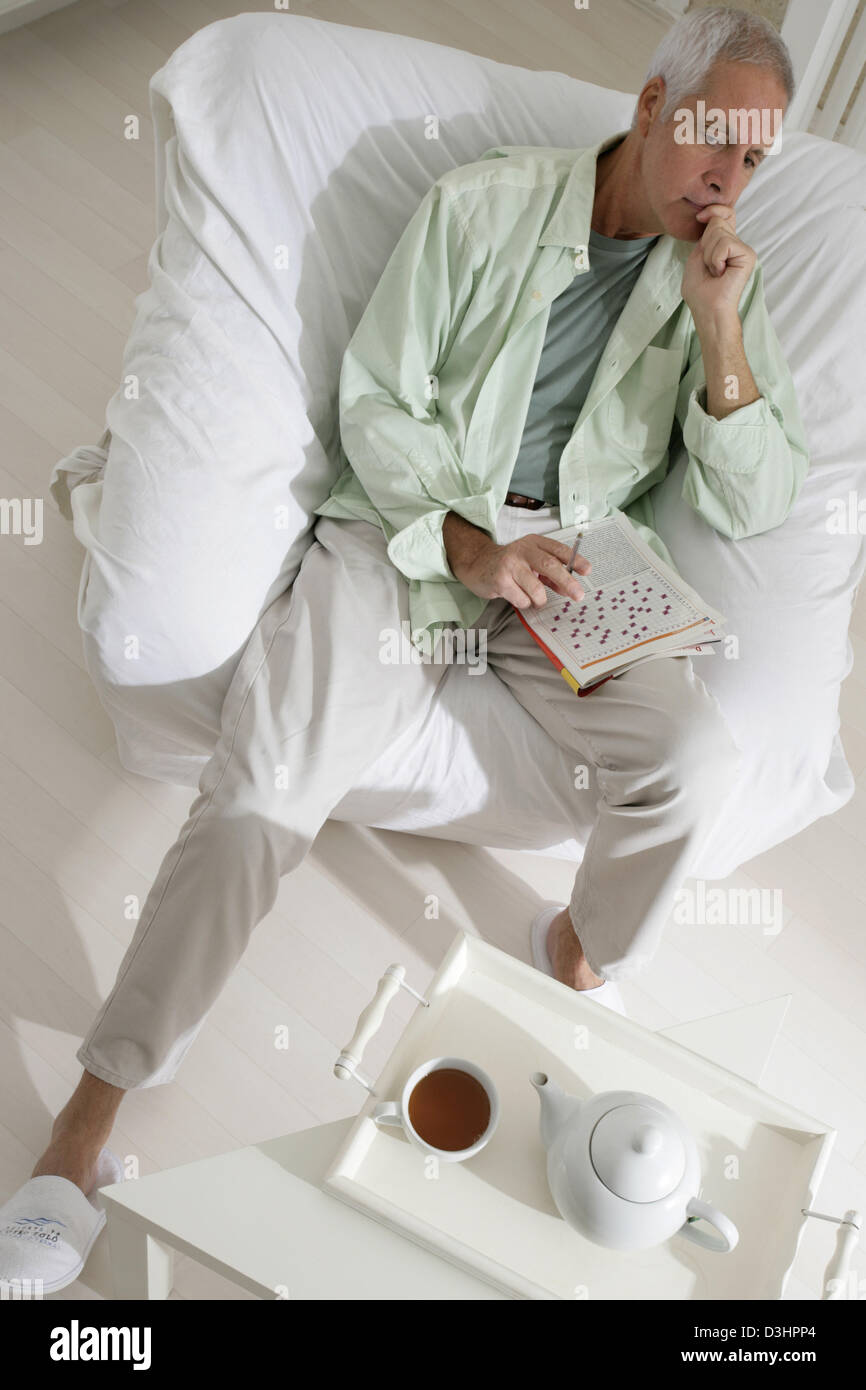 ELDERLY PERSON INDOORS Stock Photo - Alamy