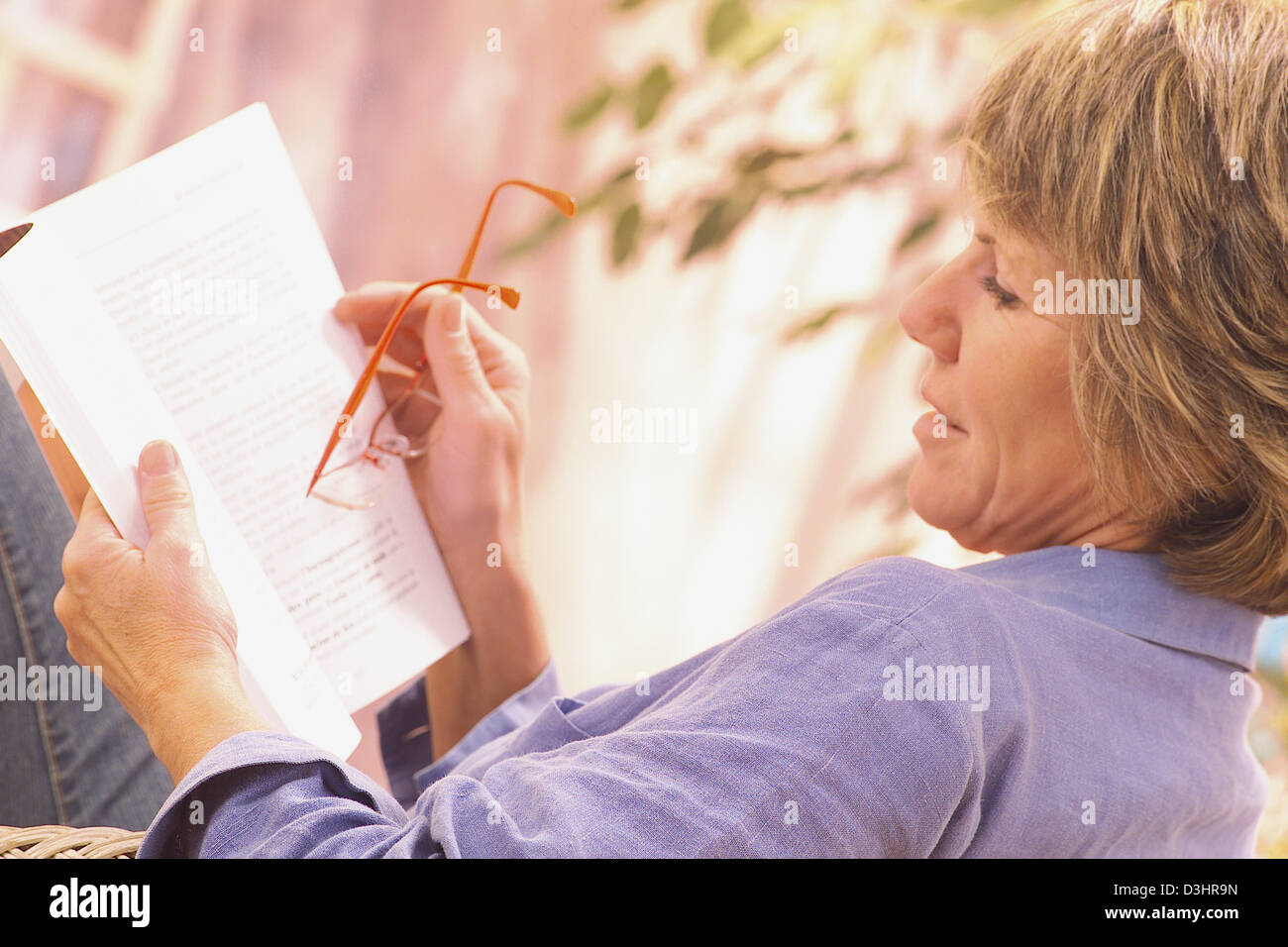 ELDERLY PERSON READING Stock Photo - Alamy