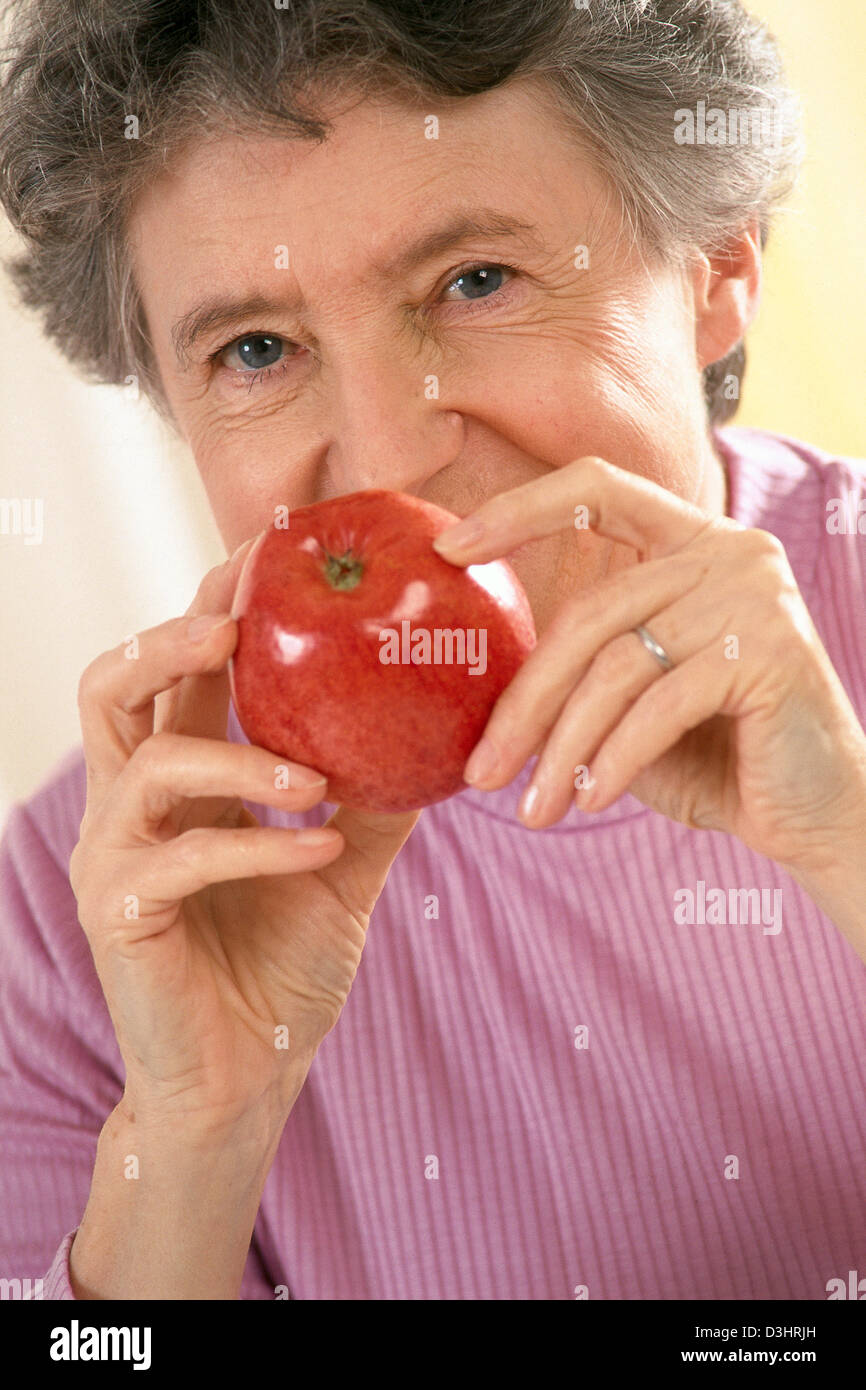 ELDERLY PERSON EATING FRUIT Stock Photo - Alamy