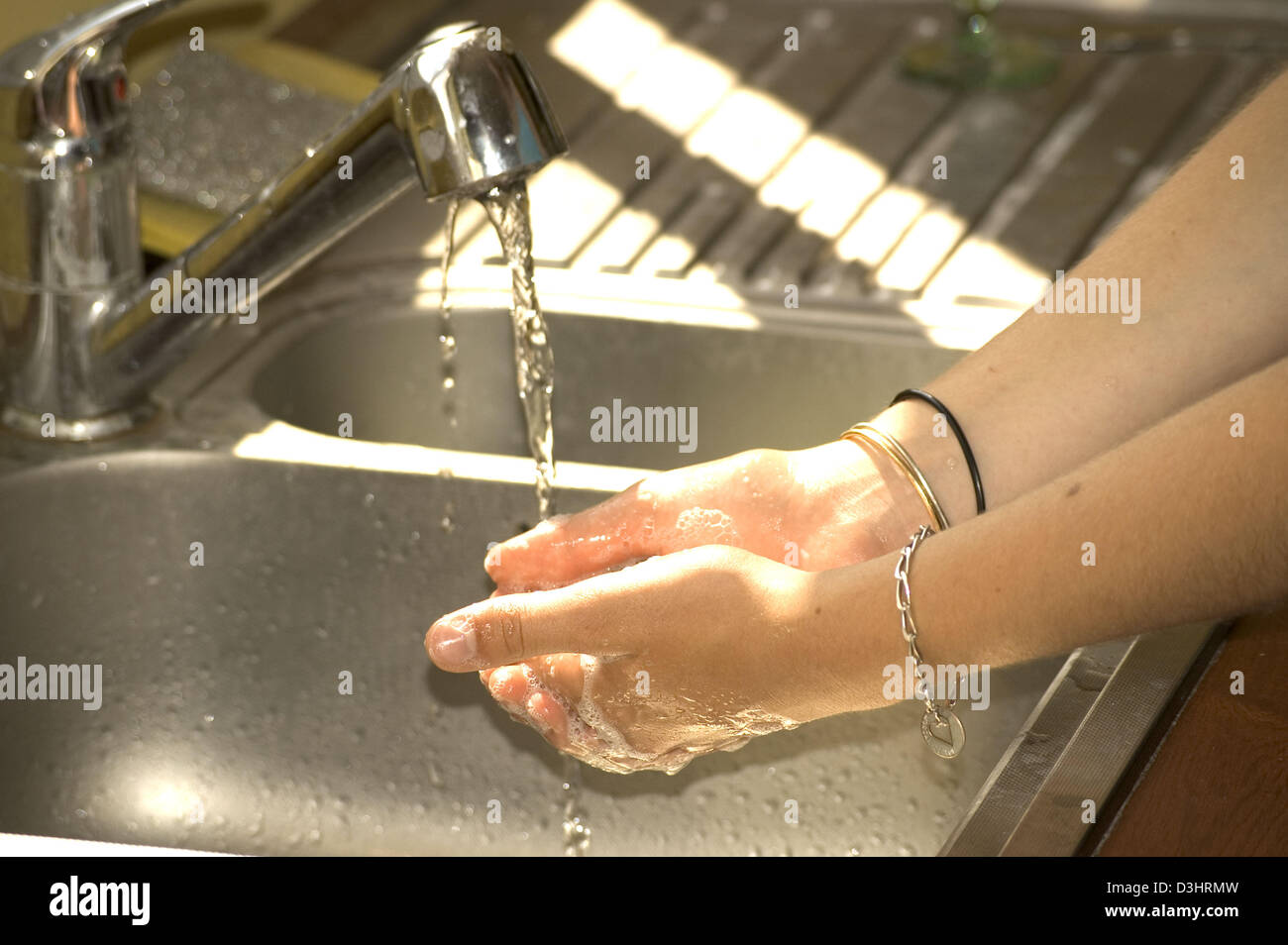 HAND WASHING, WOMAN Stock Photo - Alamy