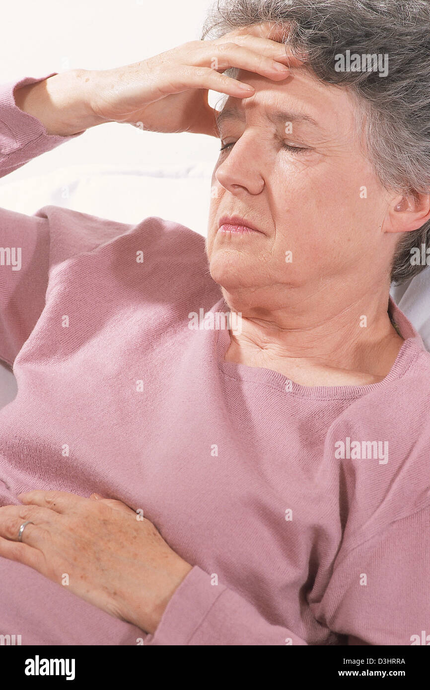 TIRED ELDERLY PERSON Stock Photo - Alamy