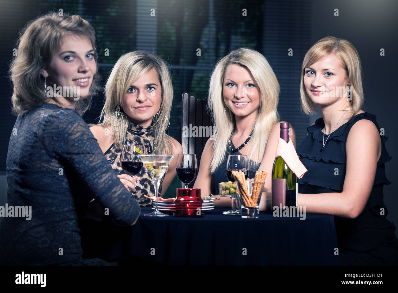 group of a young women in the restaurant Stock Photo - Alamy