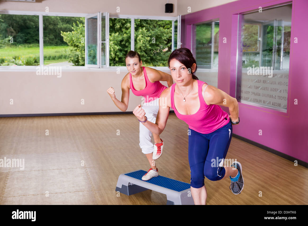 young woman in sport dress at training Stock Photo - Alamy