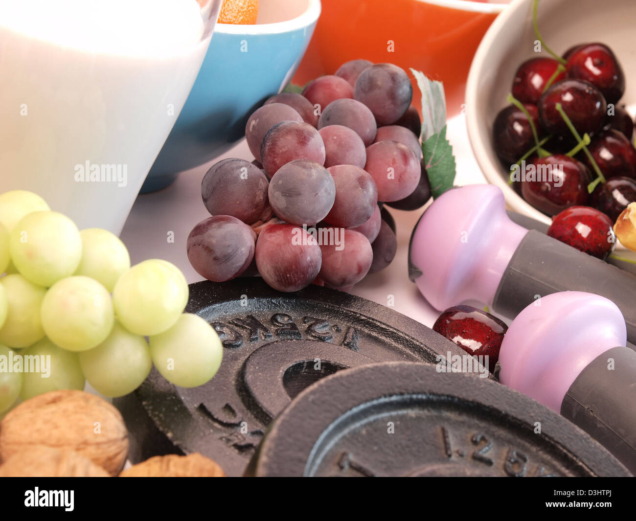 Fresh fruits with heavy weights and milk Stock Photo - Alamy