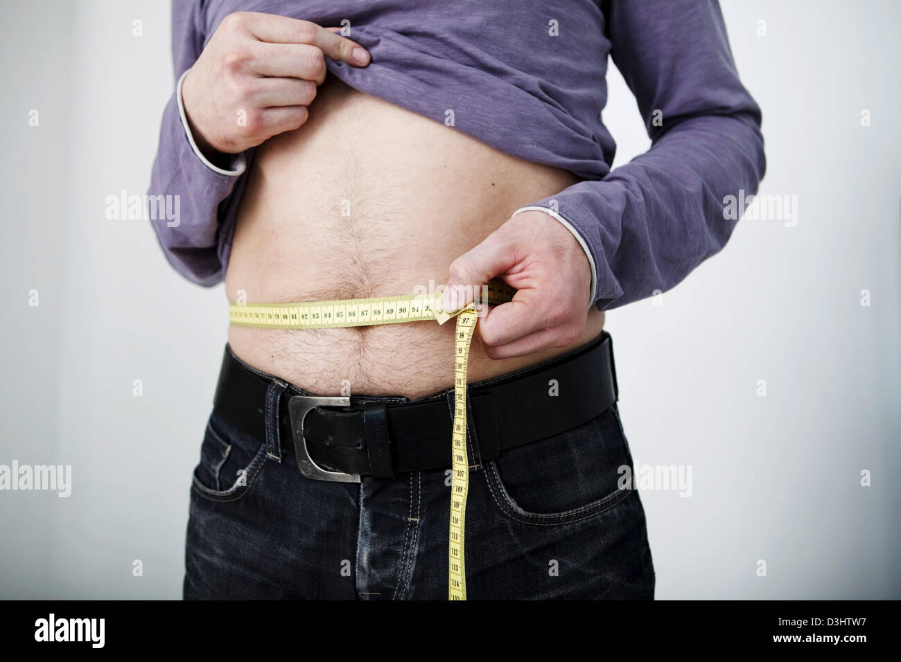 MAN'S WAIST CIRCUMFERENCE Stock Photo - Alamy
