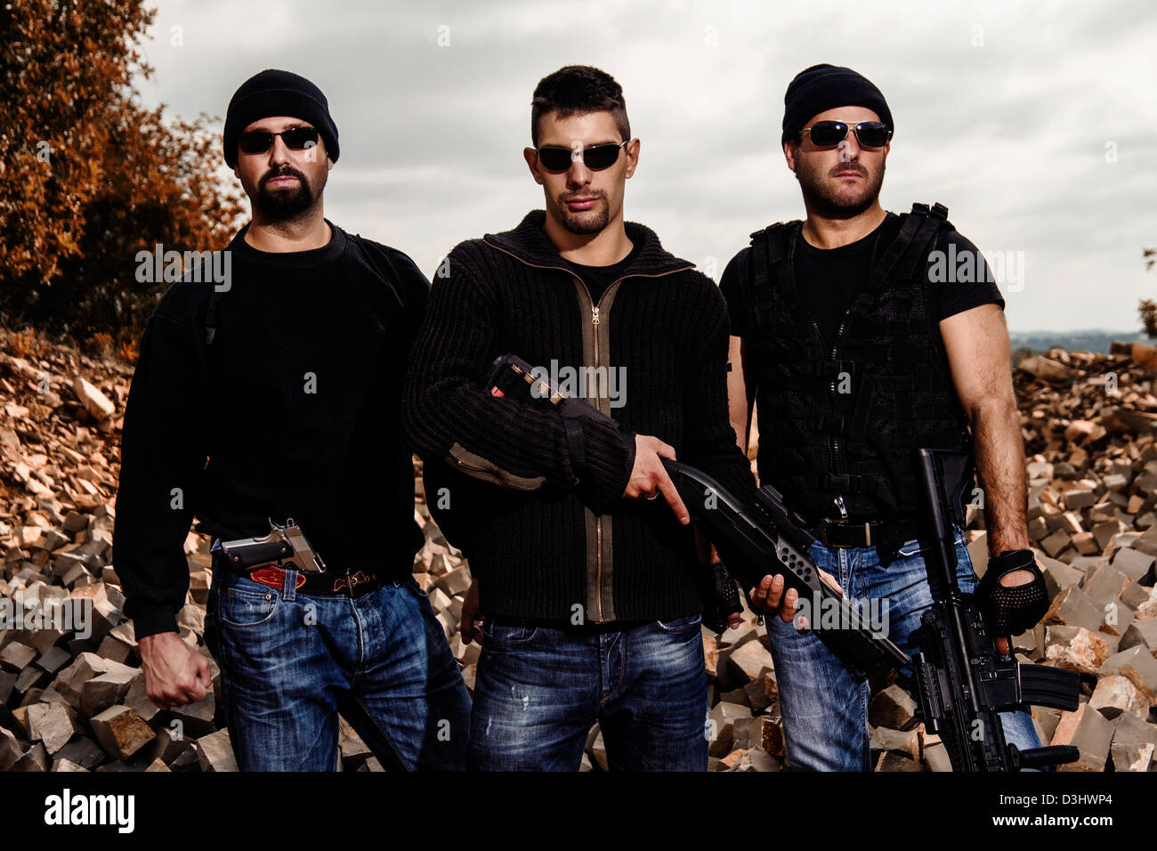 View of a group of gang members with guns Stock Photo - Alamy