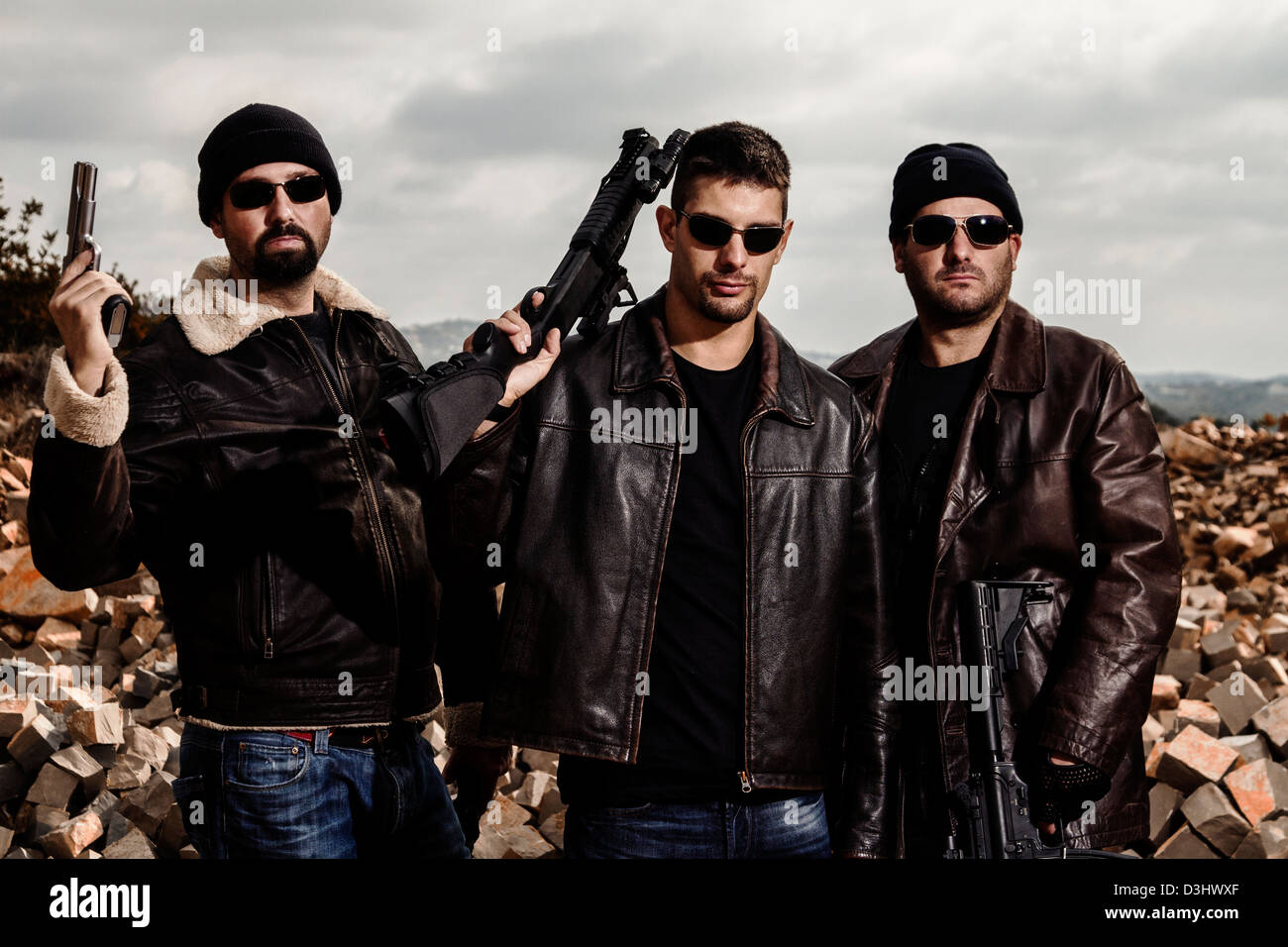 View of a group of gang members with guns Stock Photo - Alamy