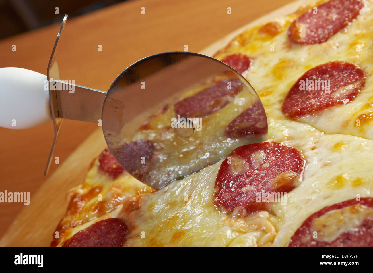 Round pizza cutter hi-res stock photography and images - Alamy