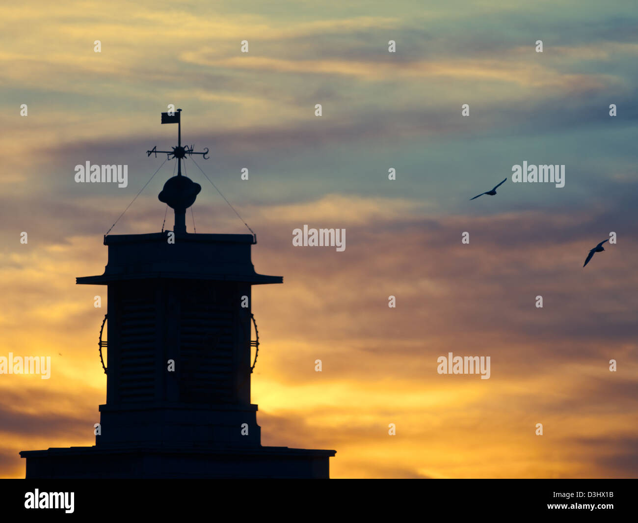 A golden sunrise breaks over the clock tower of the old Wallington Town ...