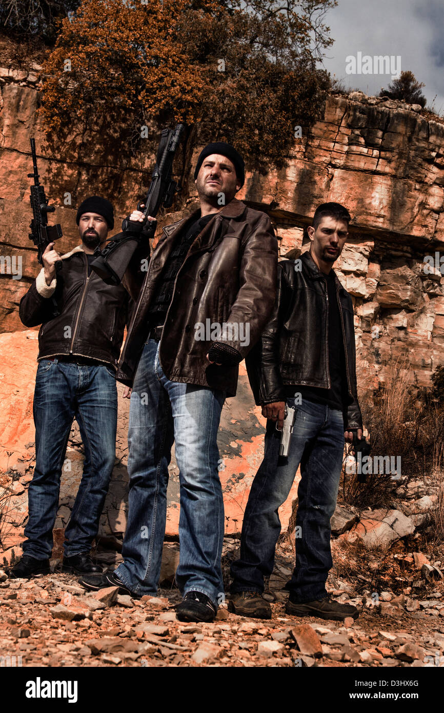 View of a group of gang members with guns Stock Photo - Alamy